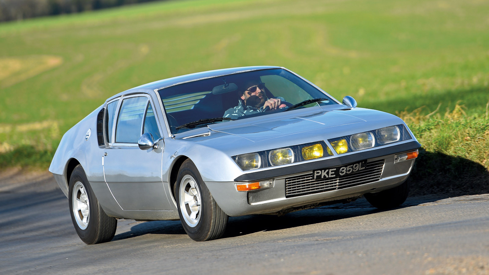 21 cars with headlights in the middle | Classic & Sports Car